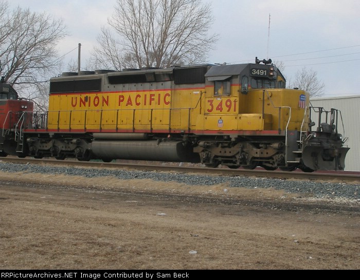 The shirt matches the locomotive